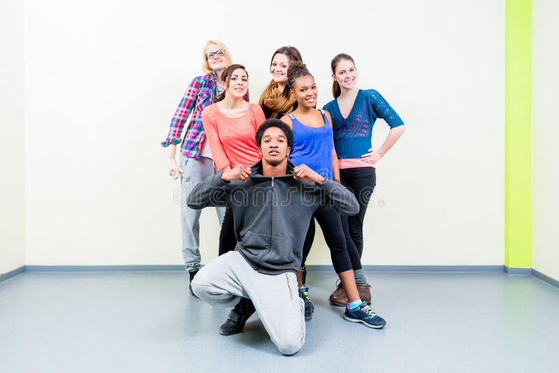 Young Men and Women in Dance Class Posing Stock Image - Image of ...