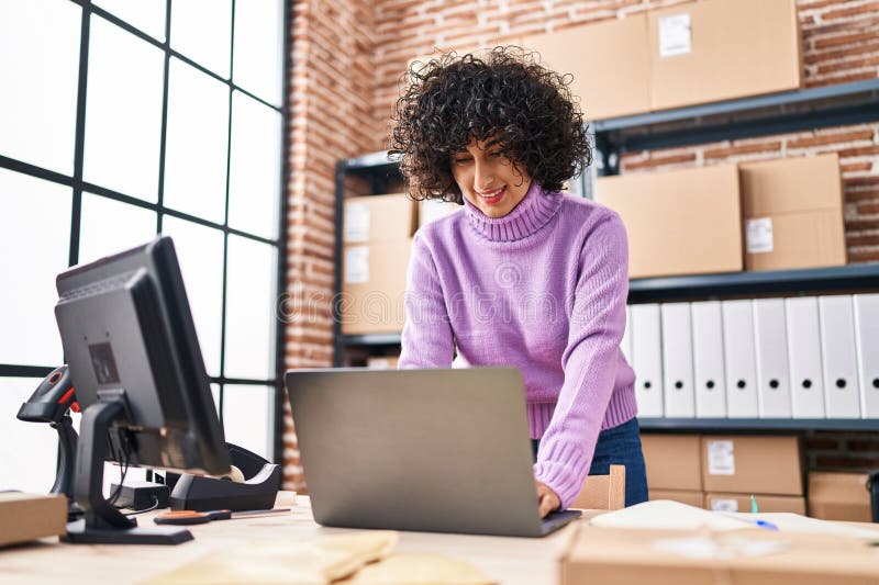 Young Middle East Woman Ecommerce Busines Worker Using Laptop Working at Office Stock Photo ...