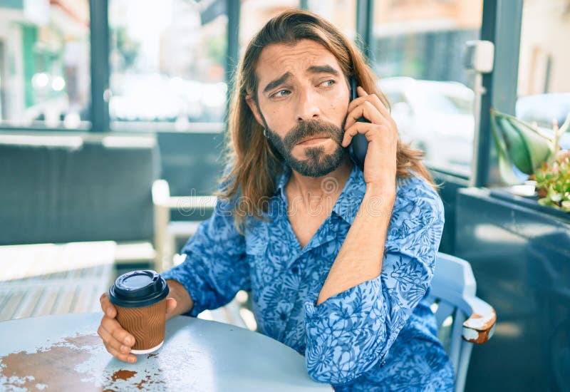 Young Middle Eastern Man with Sad Face Talking on the Smartphone and ...