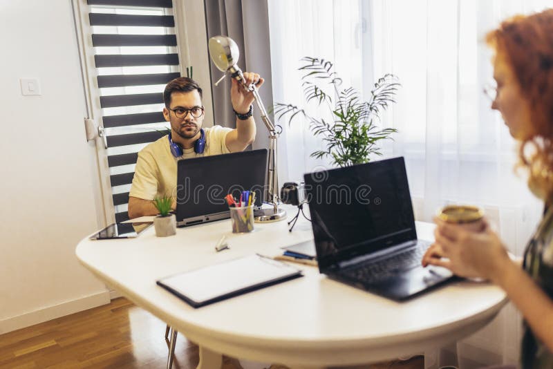 Young Couple Working at Home. Concept of Freelance and Remote Work ...