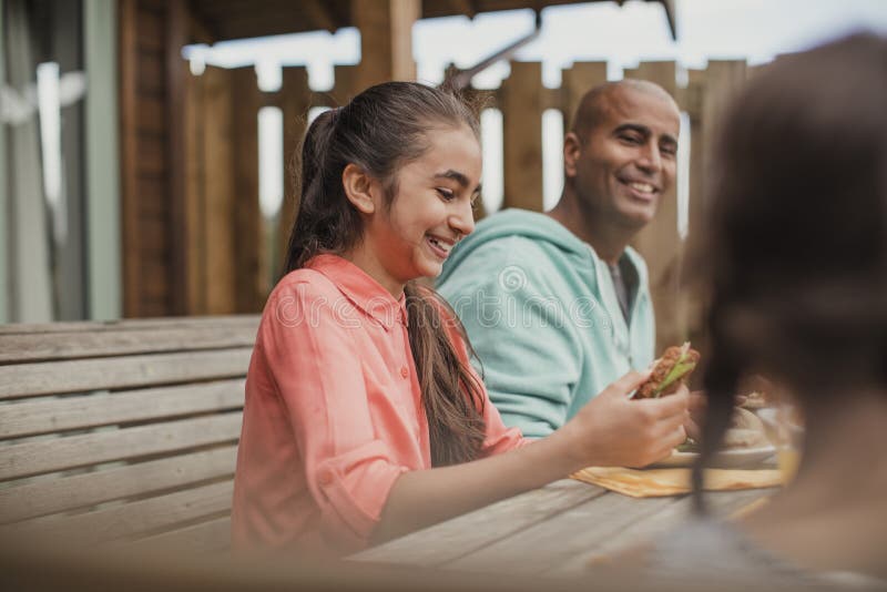 Young Girl Laughing at Brunch Stock Image - Image of mixed ...