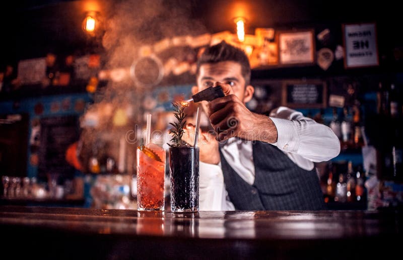 Young Mixologist Creates a Cocktail at the Bar Counter Stock Photo ...