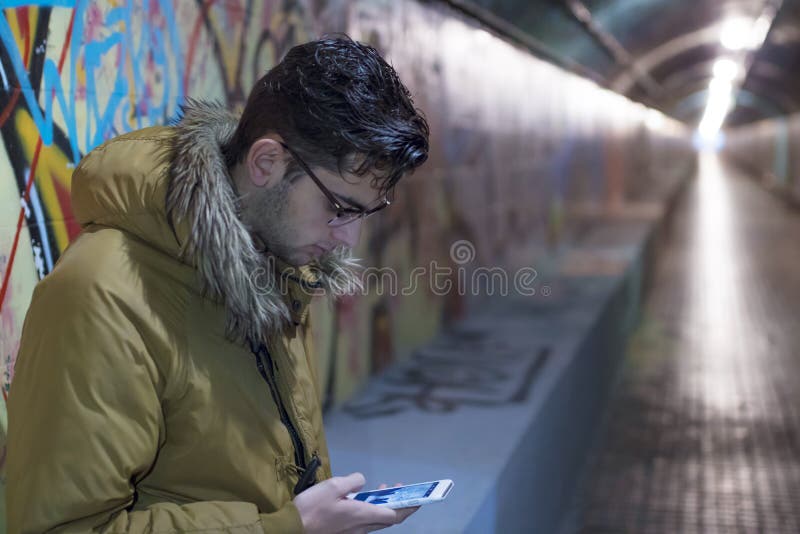 Young with Mobile Phone in the Underground Stock Photo - Image of ...