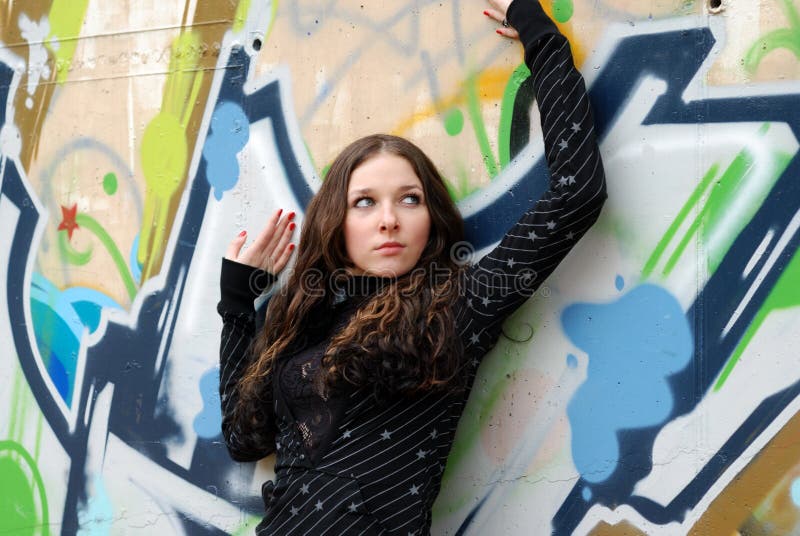 Young Model with Dark Hairs. Graffiti Wall. Fall. Stock Image - Image ...