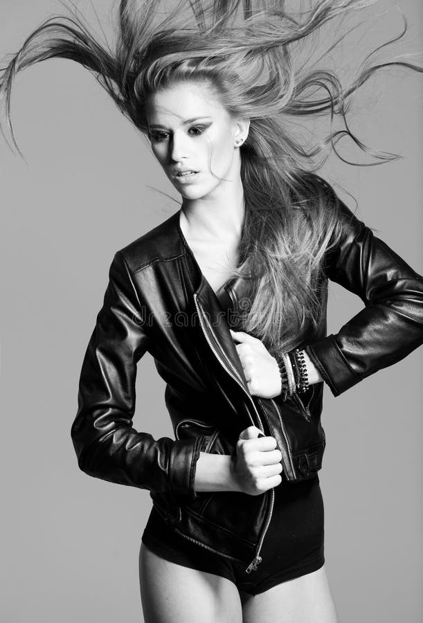 Model Wearing Leather Jacket and Black Skirt Posing Fashion Stock Image ...