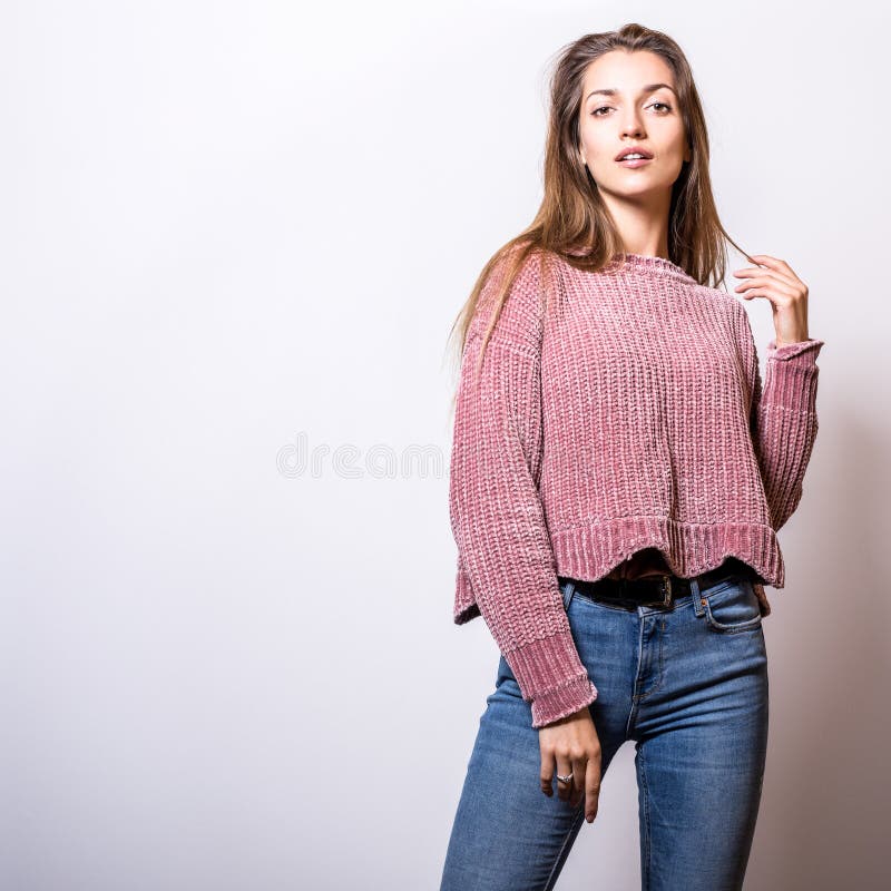 Young Model Woman in Sweater Pose in Studio. Stock Photo - Image of ...