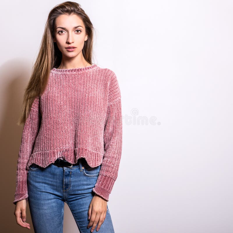 Young Model Woman in Sweater Pose in Studio. Stock Photo - Image of ...