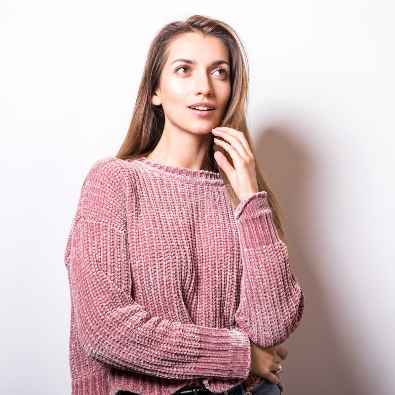 Young Model Woman in Sweater Pose in Studio. Stock Photo - Image of ...