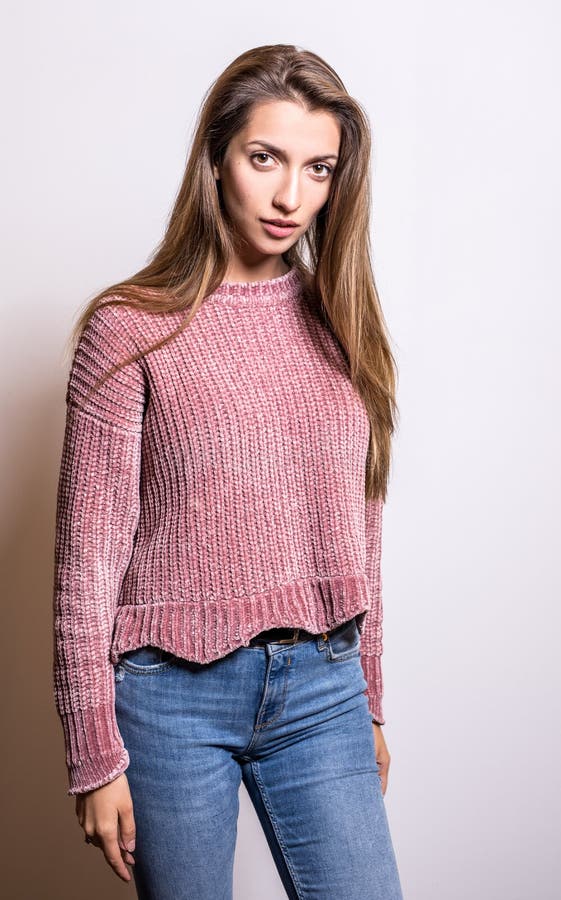 Young Model Woman in Sweater Pose in Studio. Stock Photo - Image of ...