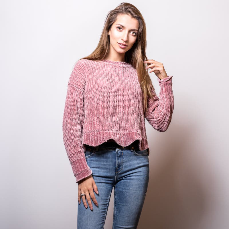 Young Model Woman in Sweater Pose in Studio. Stock Photo - Image of ...