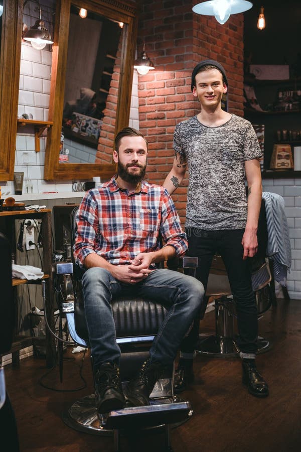 Young Modern Barber and His Handsome Content Bearded Client Stock Photo ...