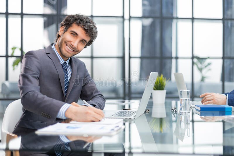 Young Modern Business Man Working Using Computer while Sitting in the ...