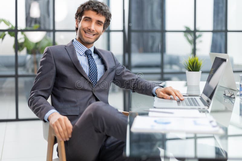 Young Modern Business Man Working Using Computer while Sitting in the ...