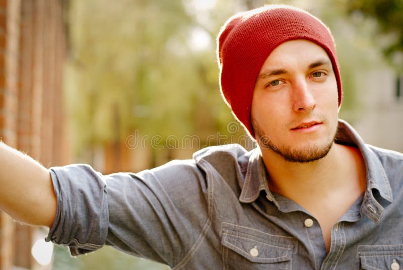 Young Modern Stylish Man with Red Cap Stock Image - Image of city ...