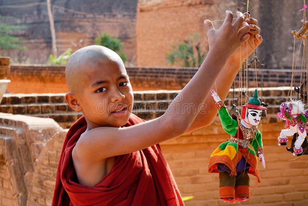 A Young Monk Playing the Puppets in Bagan, Myanmar Editorial Image ...