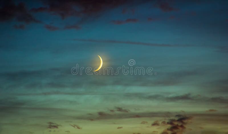 Young Moon in the Evening Sky Stock Photo - Image of shadow, satellite ...