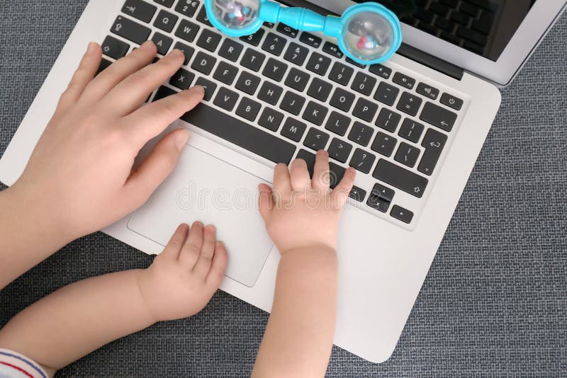 Young Mother with Baby Using Laptop Stock Photo - Image of education ...