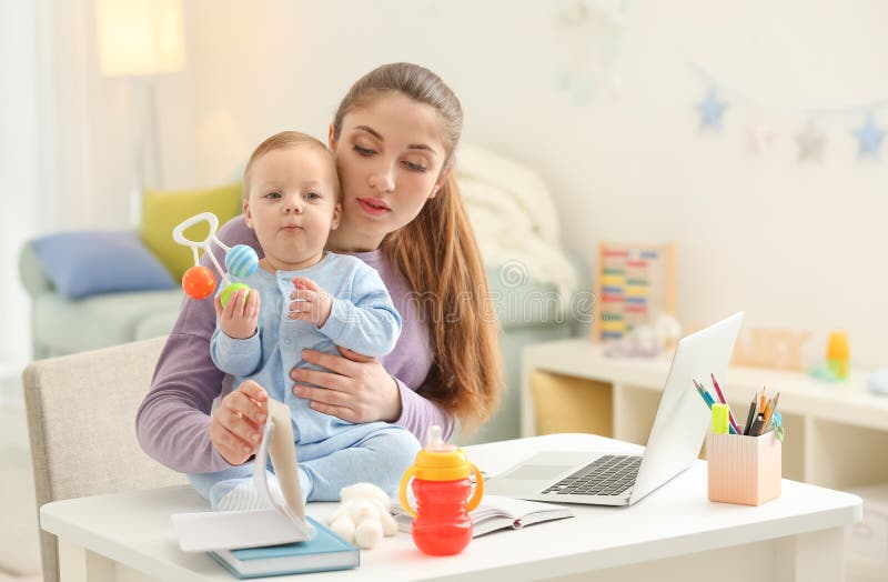 Young Mother with Baby Working at Home Stock Image - Image of child ...