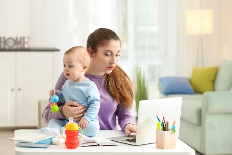 Young Mother with Baby Working at Home Stock Image - Image of adult ...