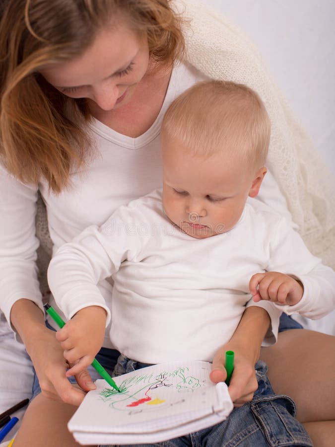 Young Mother is Drawing with Her Son Stock Photo - Image of enjoy ...