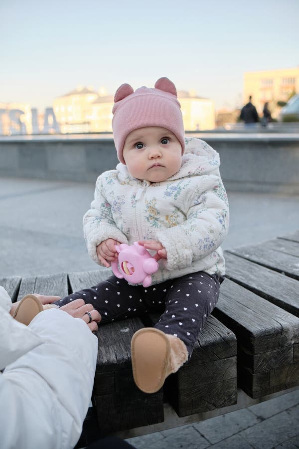 Young Mother with Her Cute Baby on Bench Stock Photo - Image of infant ...