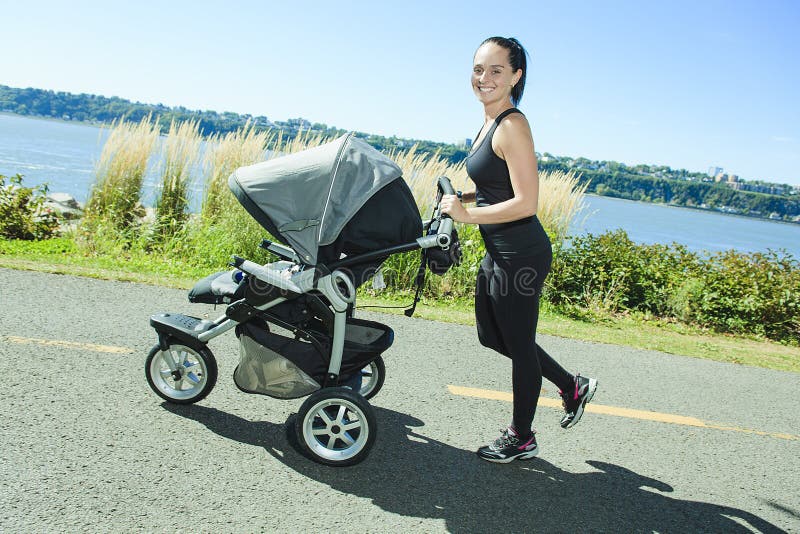 Young Mother Jogging with a Baby Buggy Stock Image - Image of healthy ...
