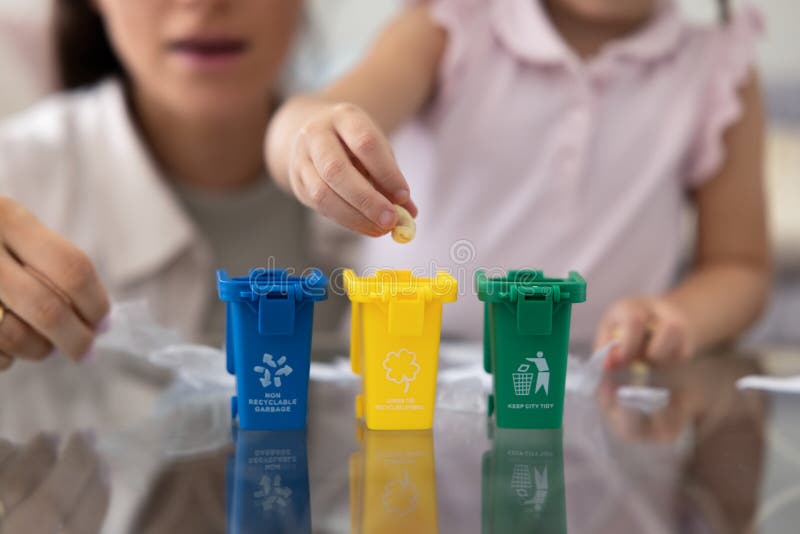 Young Mother Training Child To Sort Garbage Stock Photo - Image of ...