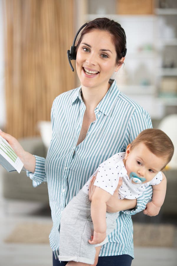 Young Mother Working with Baby Stock Photo - Image of home, caucasian ...