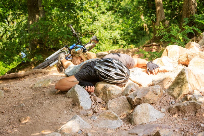 Young Mountain Biker Fallen Off His Bike Stock Image - Image of ...