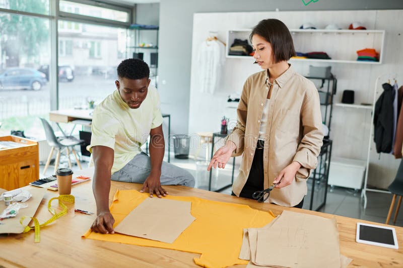 Young Multicultural Clothes Designers Working with Stock Image - Image ...