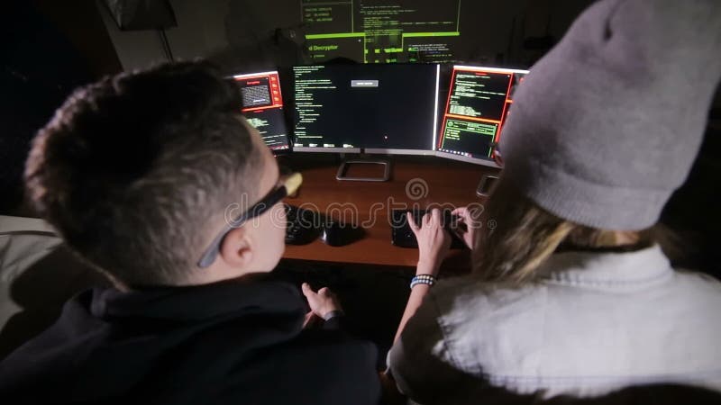 Computer Lab with a Young Man with a Prosthetic Hand Working with a ...
