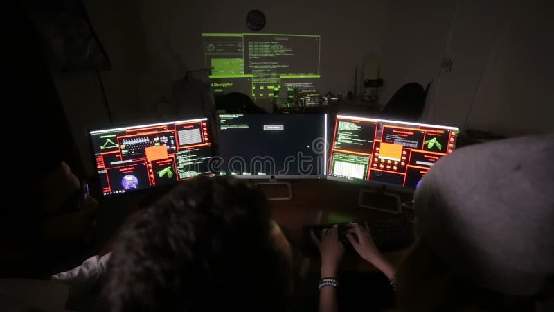 Computer Lab with a Young Man with a Prosthetic Hand Working with a ...