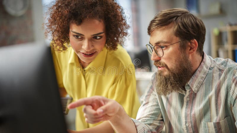 Young Multiethnic Creative Team Brainstorming and Problem Solving ...