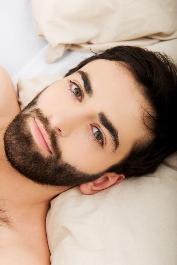 Young Muscular Man Lying in Bed. Stock Image - Image of fitness, male ...