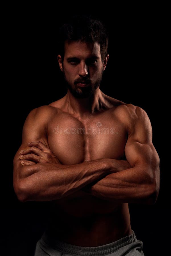 Young Man with Muscular Body Showing His Strength Stock Image - Image ...