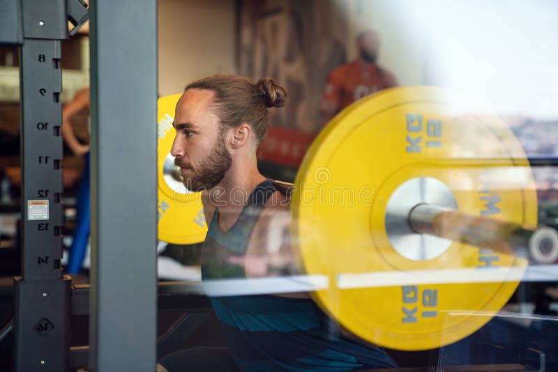 Young Muscular Man during Workout in the Gym Stock Photo - Image of ...