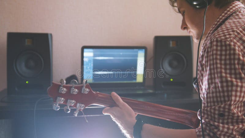 Young Musician Composes and Records Music Playing the Electric Guitar ...