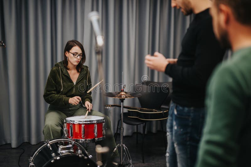 Young Musicians Practicing Performance in a Studio Setting with ...
