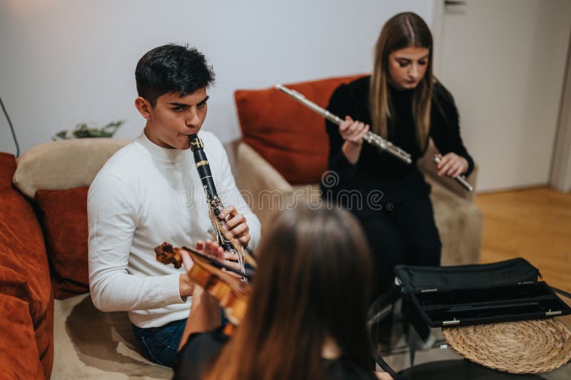 Young Musicians Practicing Together at Home with Diverse Musical ...