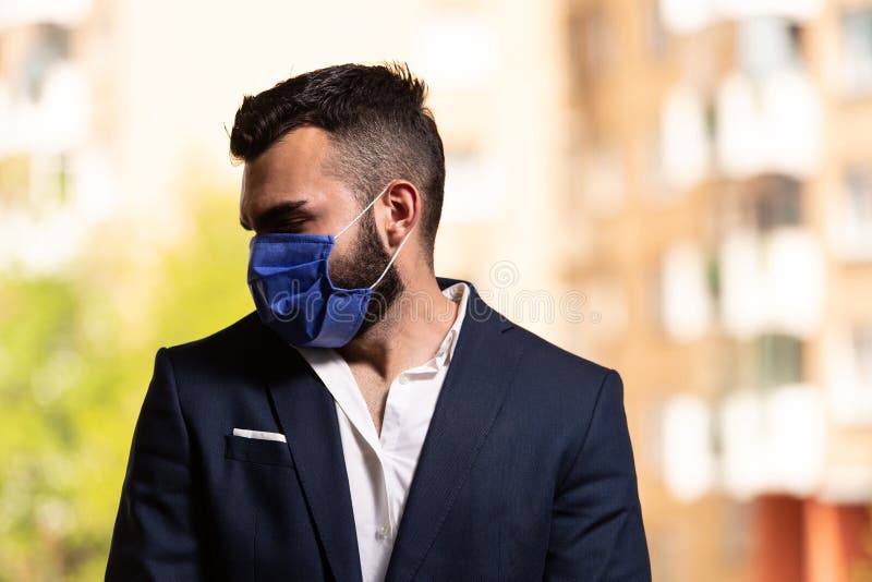 Young Muslim Man Praying Outdoors while Wearing a Protective Mask Stock ...