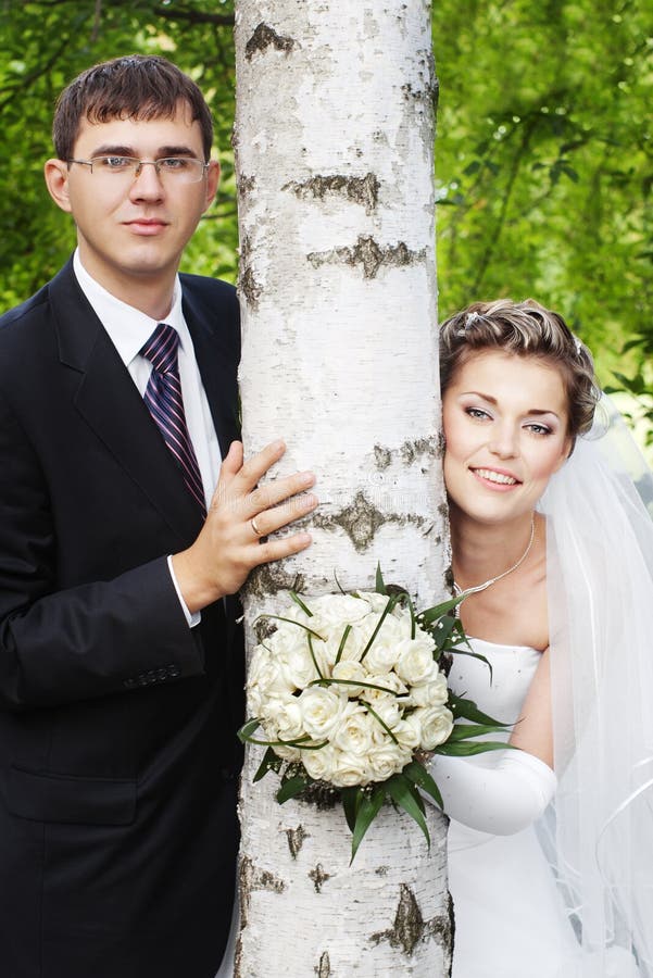 Young Newlyweds and Birch Tree Stock Photo - Image of couple, male ...