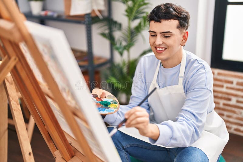 Young Non Binary Man Artist Smiling Confident Drawing at Art Studio ...