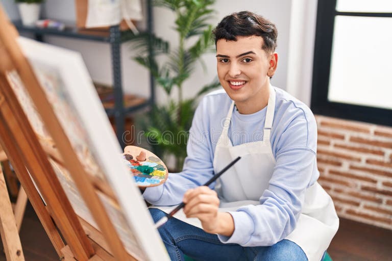 Young Non Binary Man Artist Smiling Confident Drawing at Art Studio ...