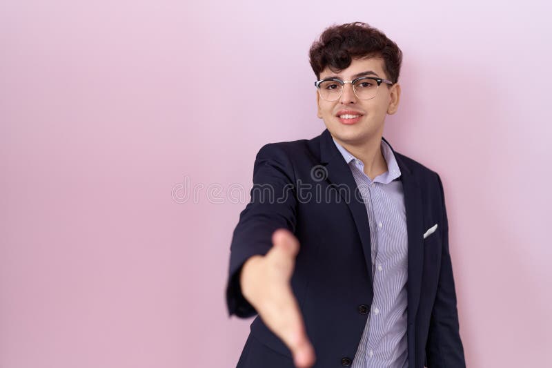 Young Non Binary Man with Beard Wearing Suit and Tie Smiling Friendly ...