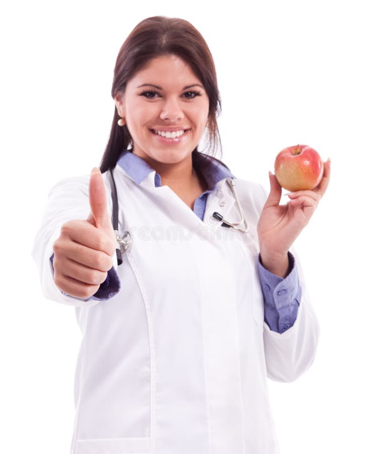 Young nurse holding apple stock photo. Image of give - 39472928