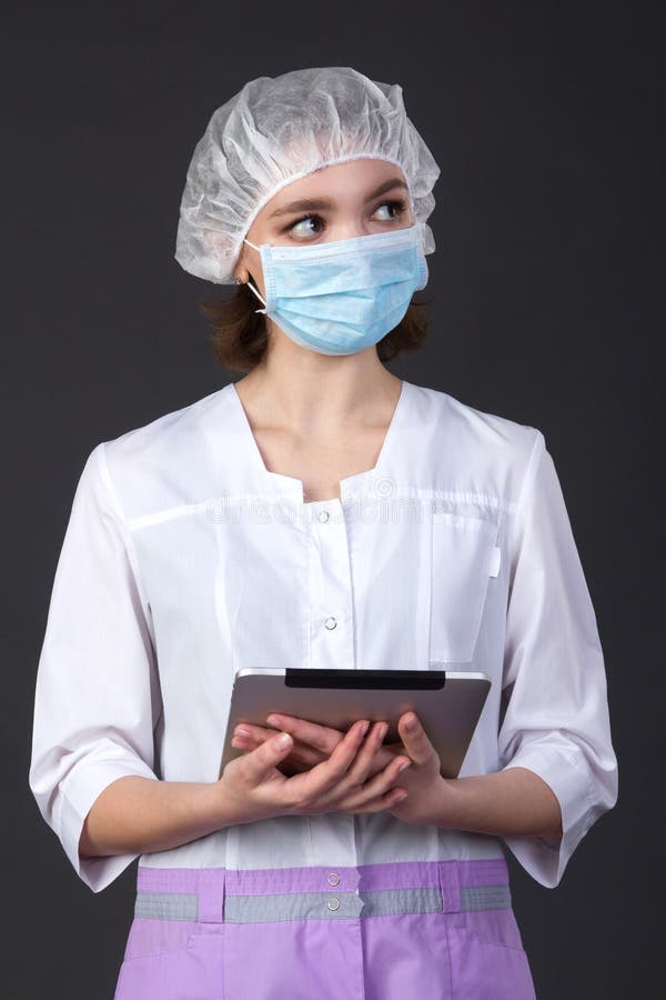 Young Nurse Holding Touch Pad Stock Photo - Image of hospital ...