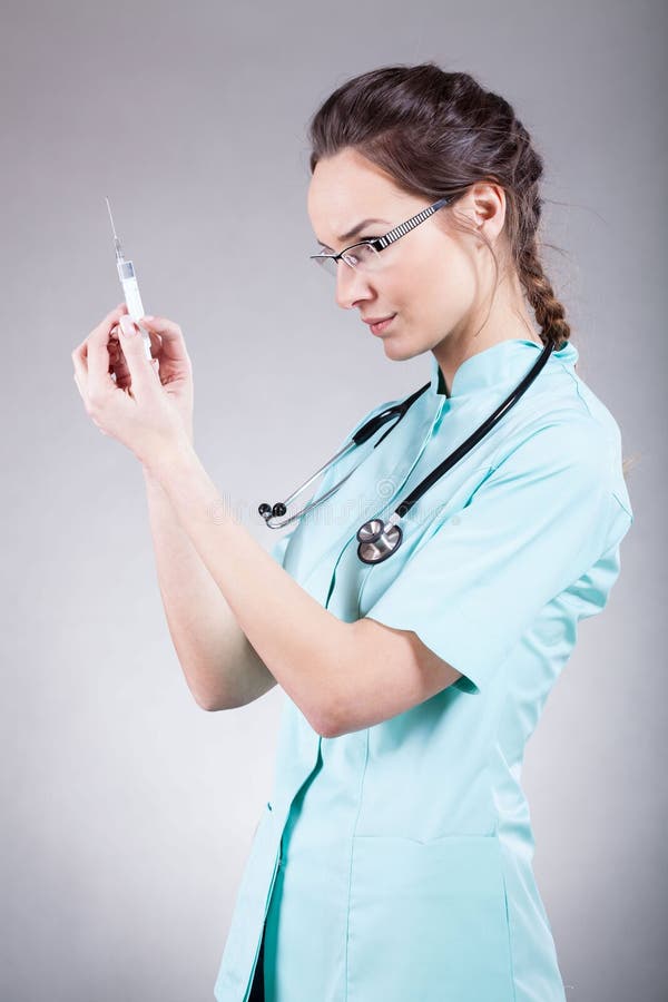 Young Nurse Preparing Injection Stock Photo - Image of clinic, care ...
