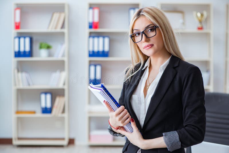 The Young Office Assistant in the Office Stock Photo - Image of ...