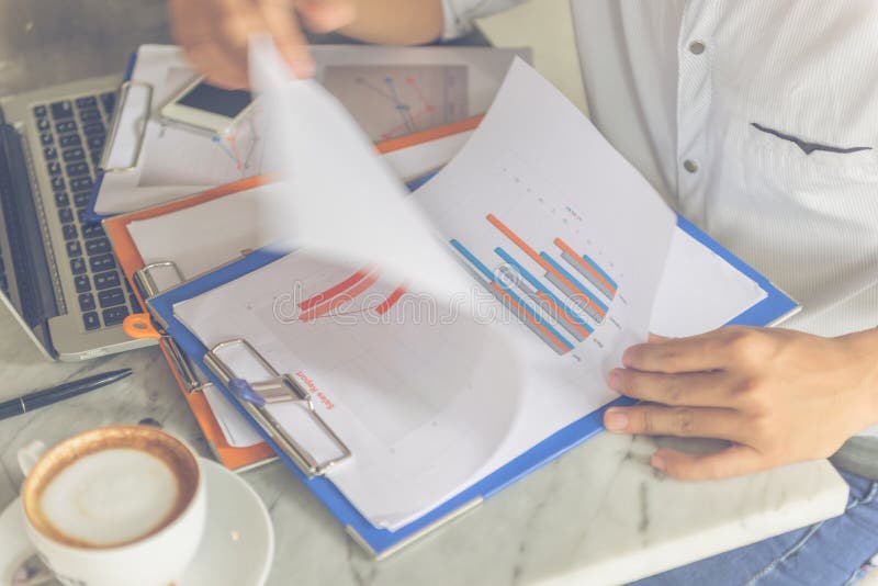 Young Office Employee Reading Financial Report Document Stock Image ...