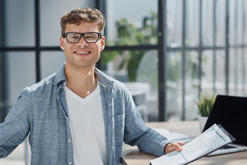 Young Office Man at Workplace Making Notes Stock Image - Image of ...